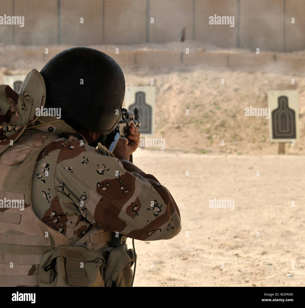 Fam' Fire. CONTINGENCY OPERATING BASE SPEICHER, Iraq – An Iraqi soldier ...