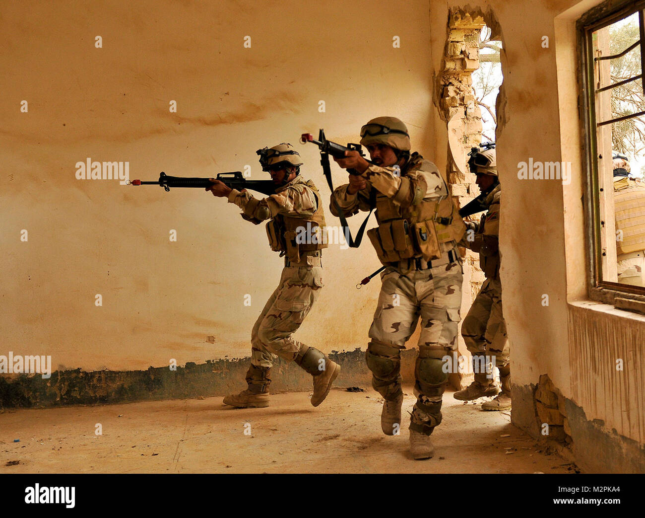 Iraqi soldiers storm room. FORWARD OPERATING BASE NORMANDY, Iraq ...
