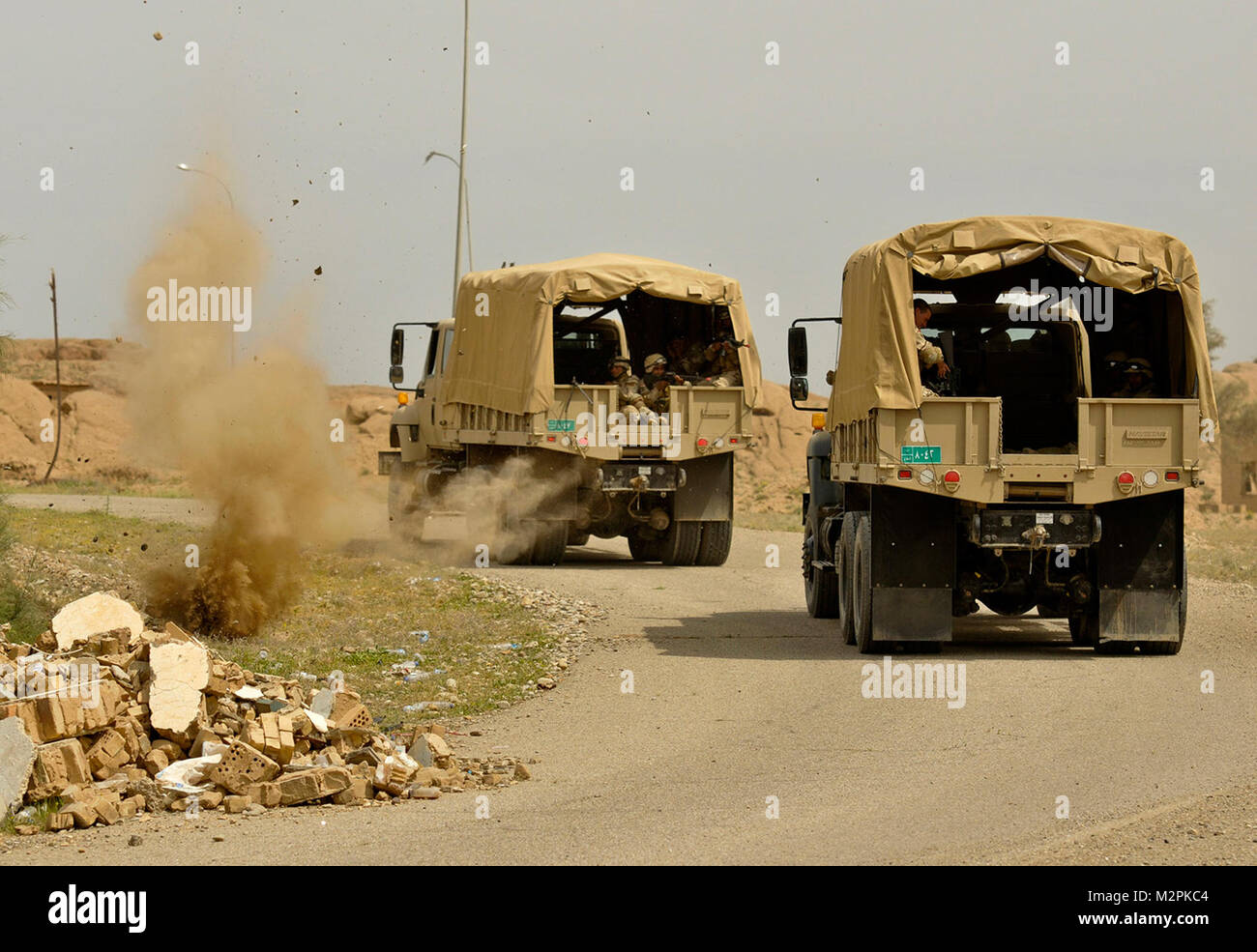 Iraqi troops react to IED. FORWARD OPERATING BASE NORMANDY, Iraq ...