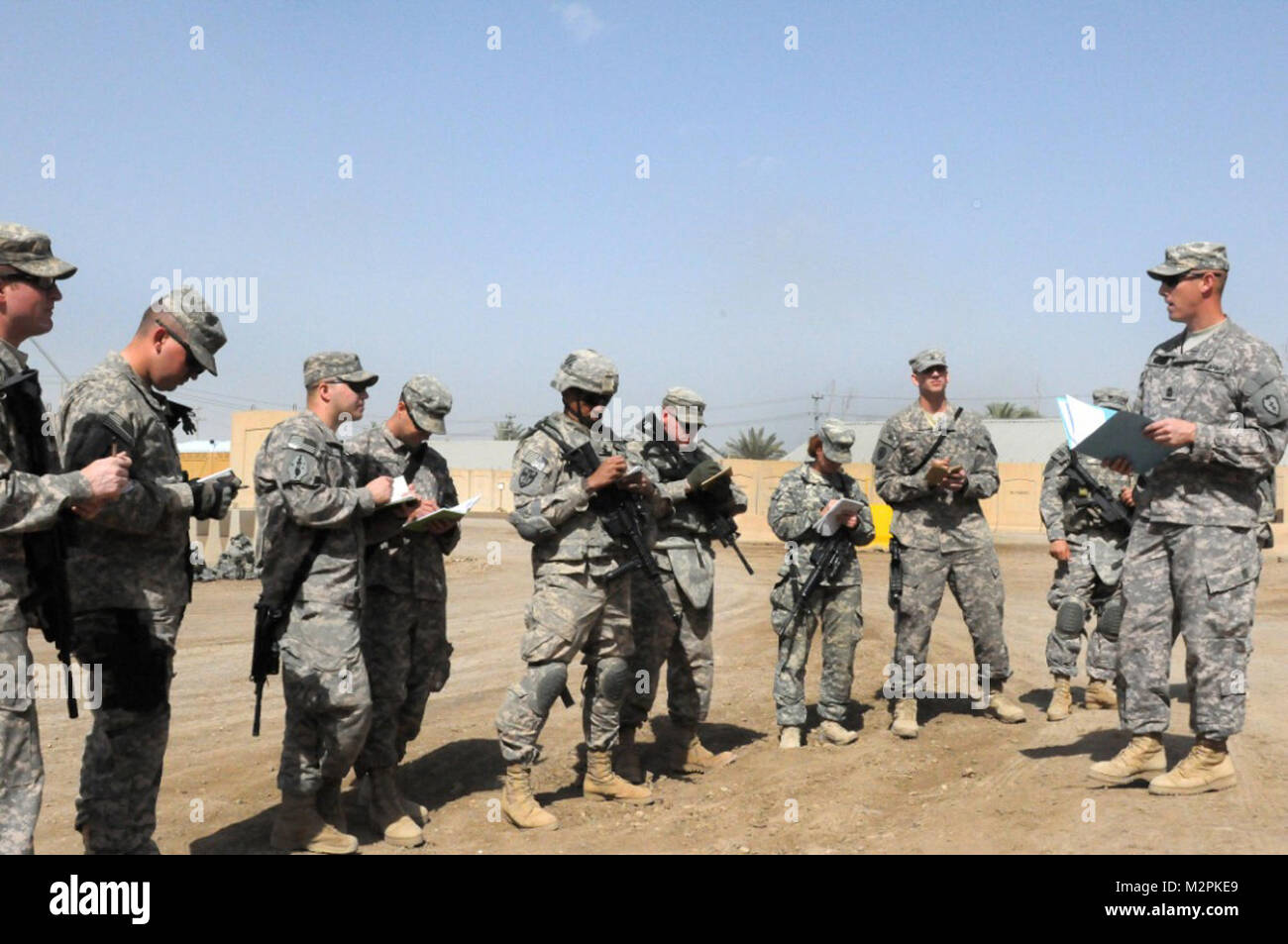 Sgt. Maj. Matthew McCoy gives out directions to the platoon leaders ...