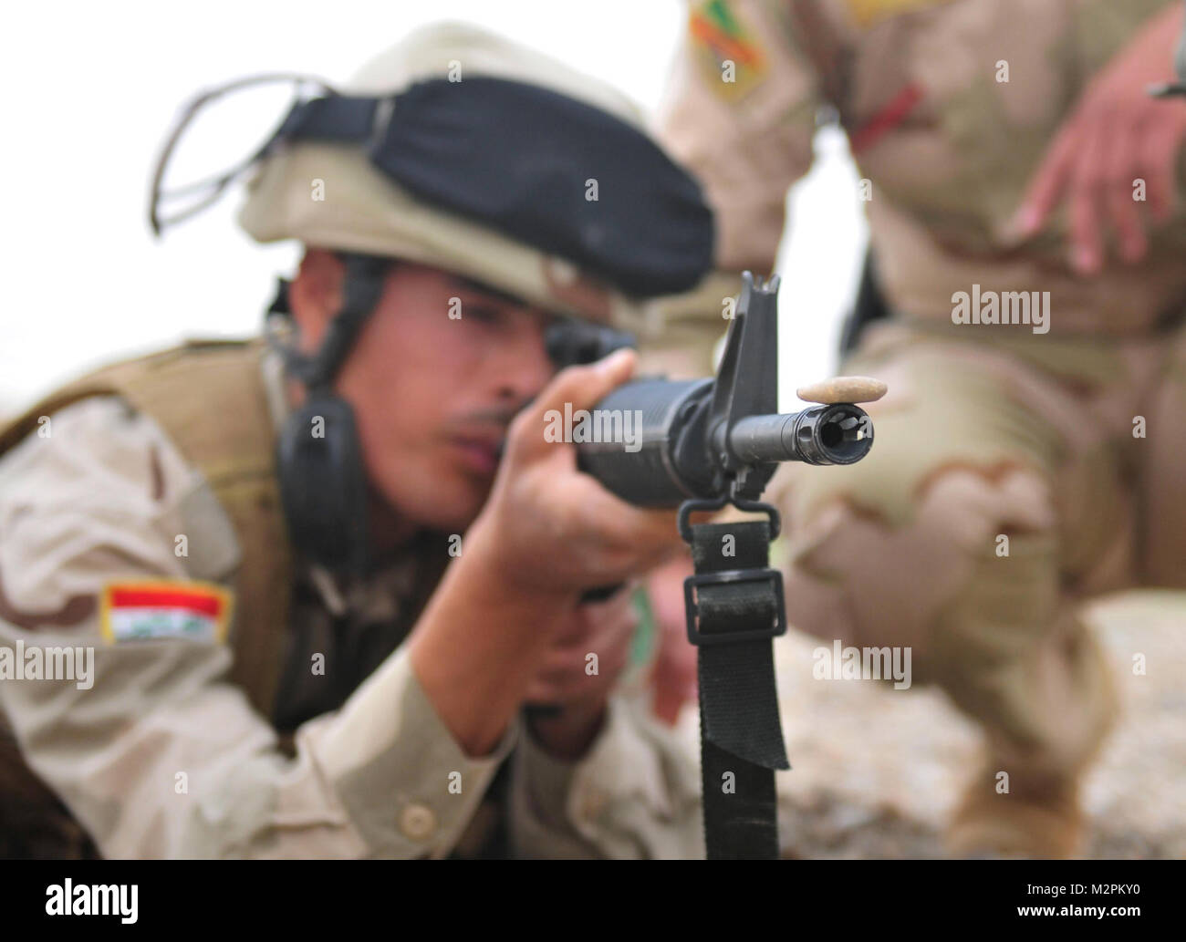 Trigger Squeeze. CONTINGENCY OPERATING SITE WARRIOR, Iraq – An Iraqi ...