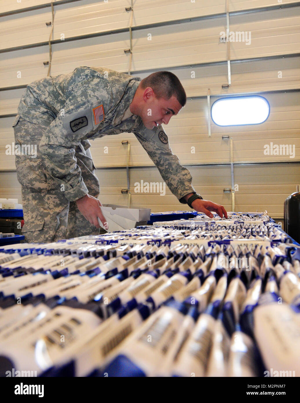 Sgt. Adam Blanton searches through hudnreds of prescription for ...