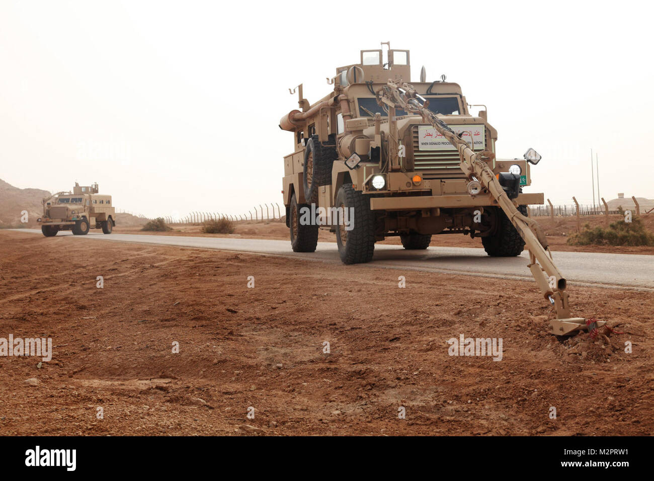 Iraqi Army Soldiers with the 7th Iraqi Army Division use an remote arm ...