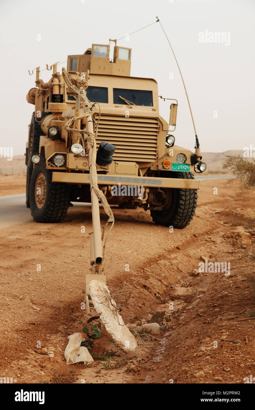 Iraqi Army Soldiers with the 7th Iraqi Army Division use an remote arm ...