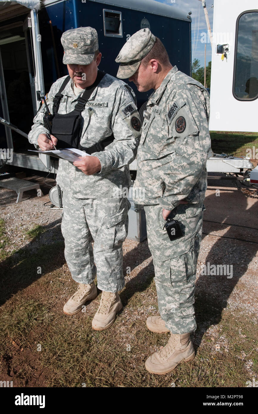 Lt. Col. Hiram Tabler (right) commander of the 63rd Civil Support Team ...