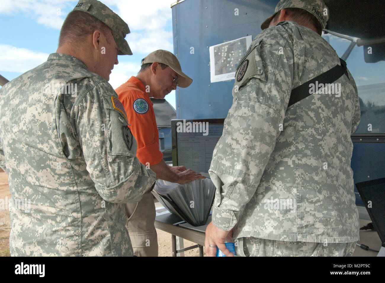 Lt. Col. Hiram Tabler (left), commander of the 63rd Civil Support Team ...
