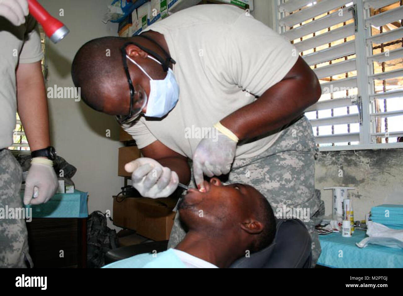 Tooth extraction in war hi-res stock photography and images - Alamy
