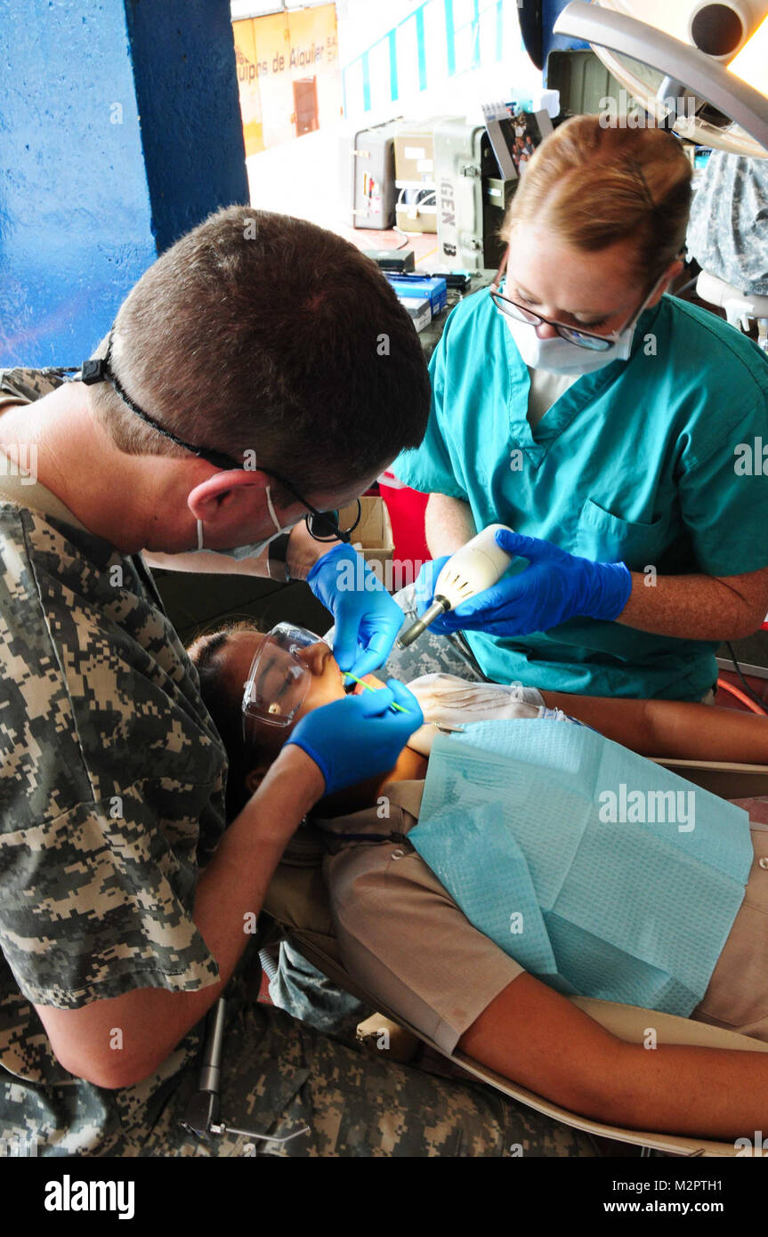 Maj. Mike Crowton and Spc. Megan Kelley of the 143rd Dental Company ...