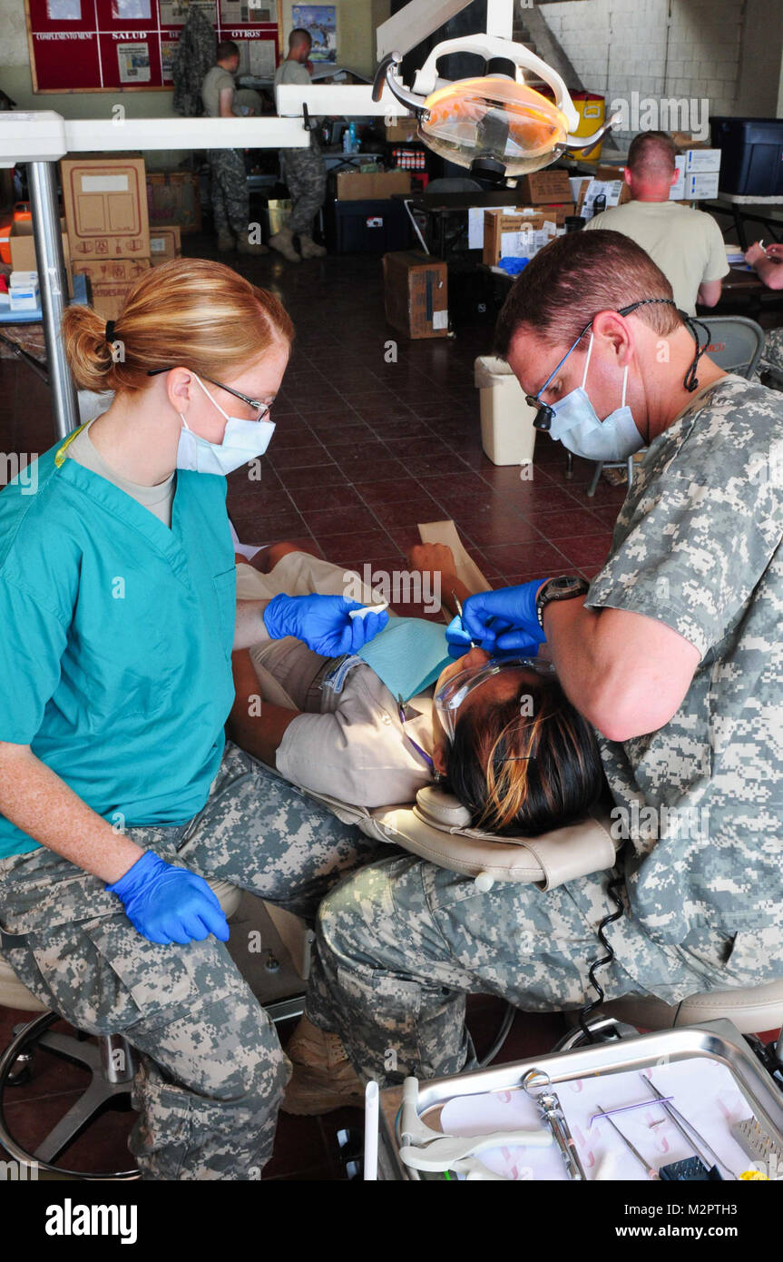 Maj. Mike Crowton and Spc. Megan Kelley of the 143rd Dental Company ...