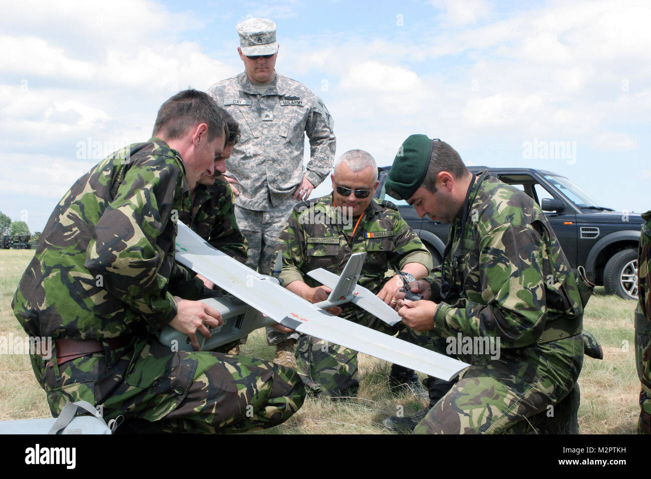 Army Sgt. Marshall Day, infantryman/RAVEN operator, observes Romanian ...
