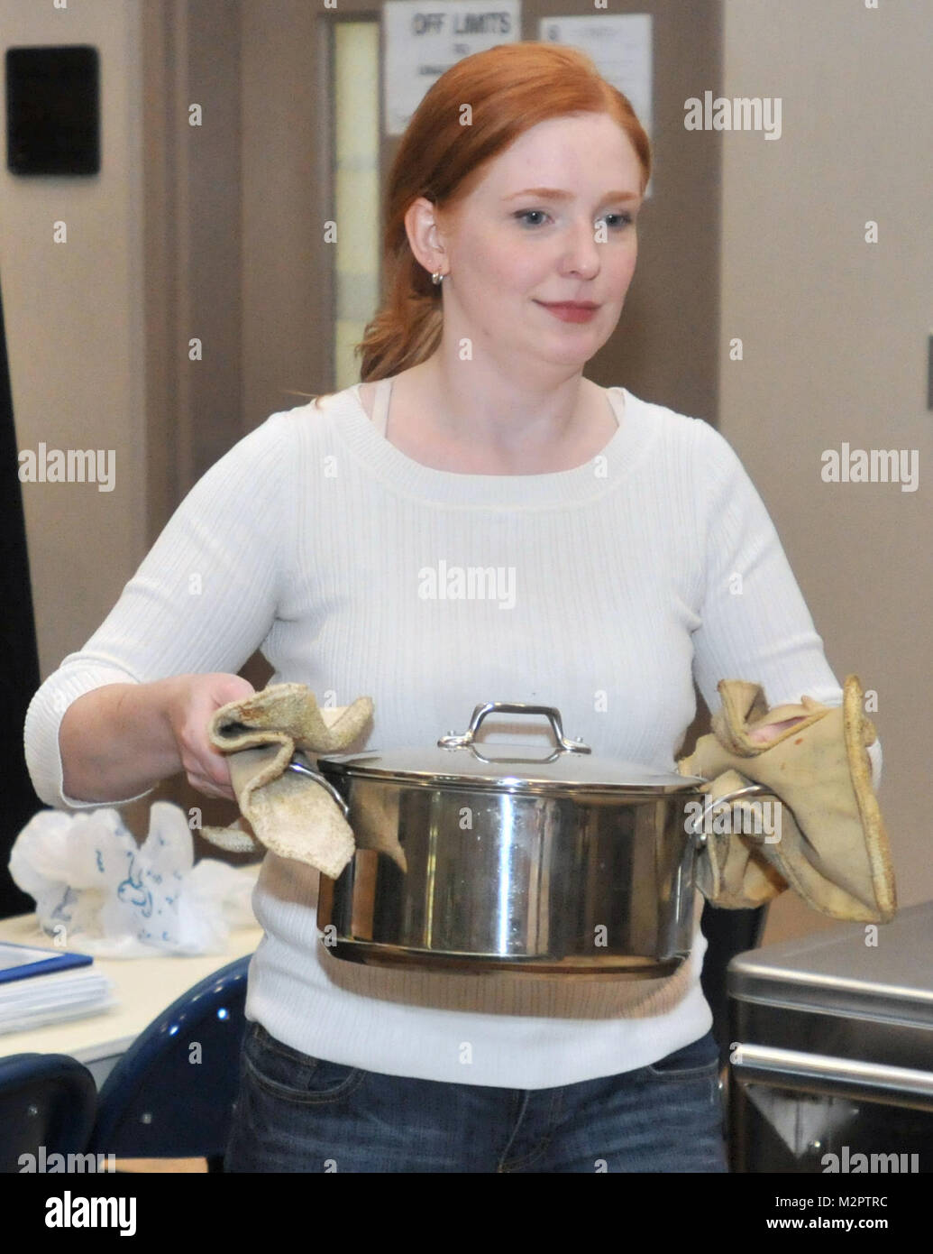 Hope Guy, 1st place winner of the 316th Chili-Cook-Off ,brings out a ...