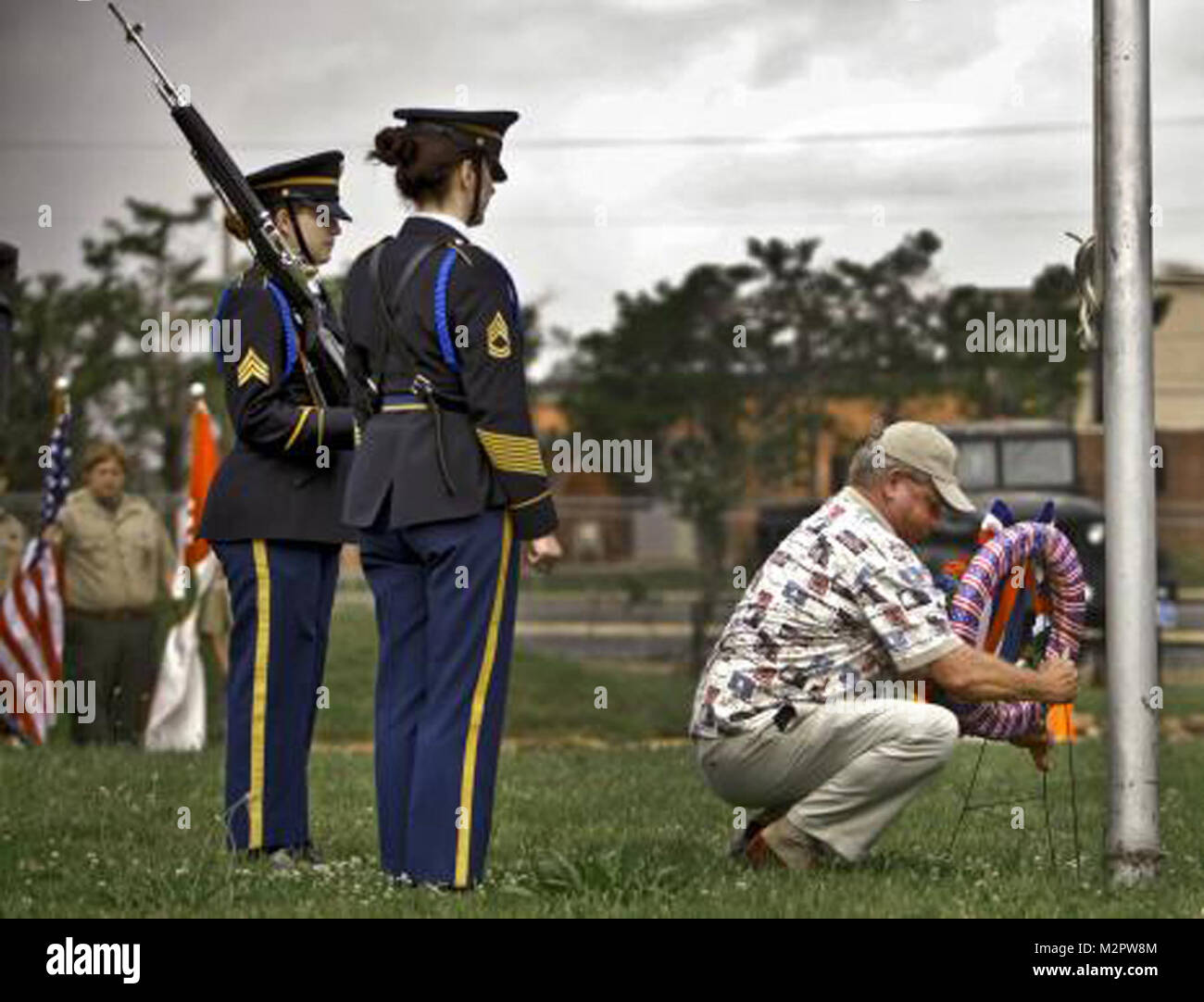 Retired Master Sgt. Steve Cope is escorted by the Governor's Honor ...