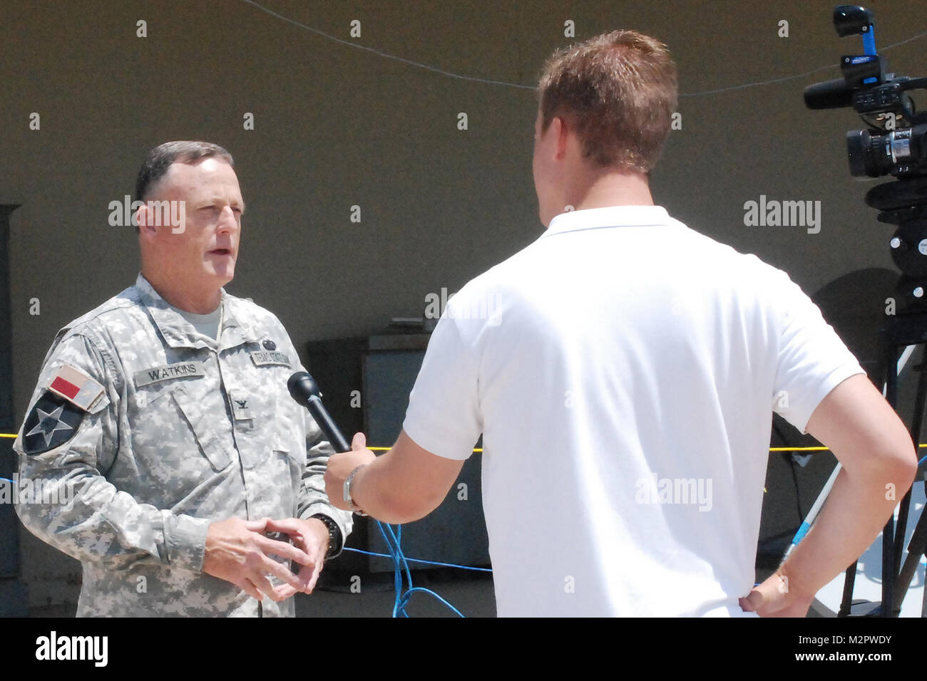 Texas State Guard member, Colonel Paul Watkins, gets interviewed by ...