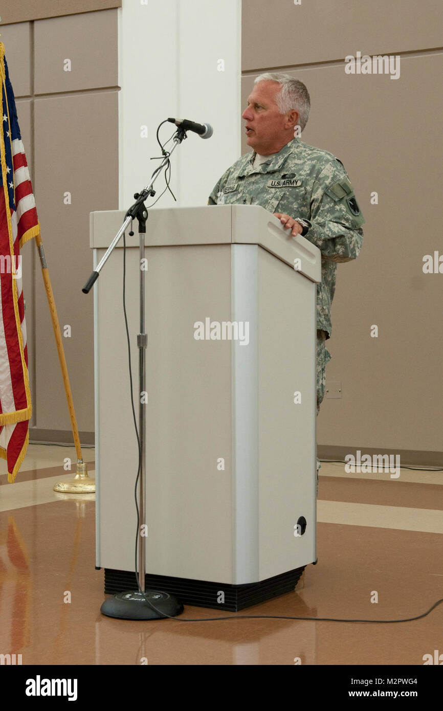 Maj. Gen. Myles Deering (center), adjutant general for Oklahoma, offers ...