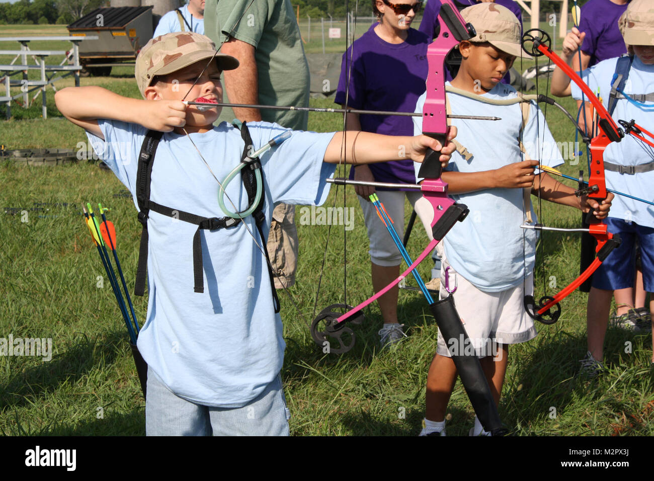 Campers at the Oklahoma National Guard Kids Kamp 2011 take aim during ...