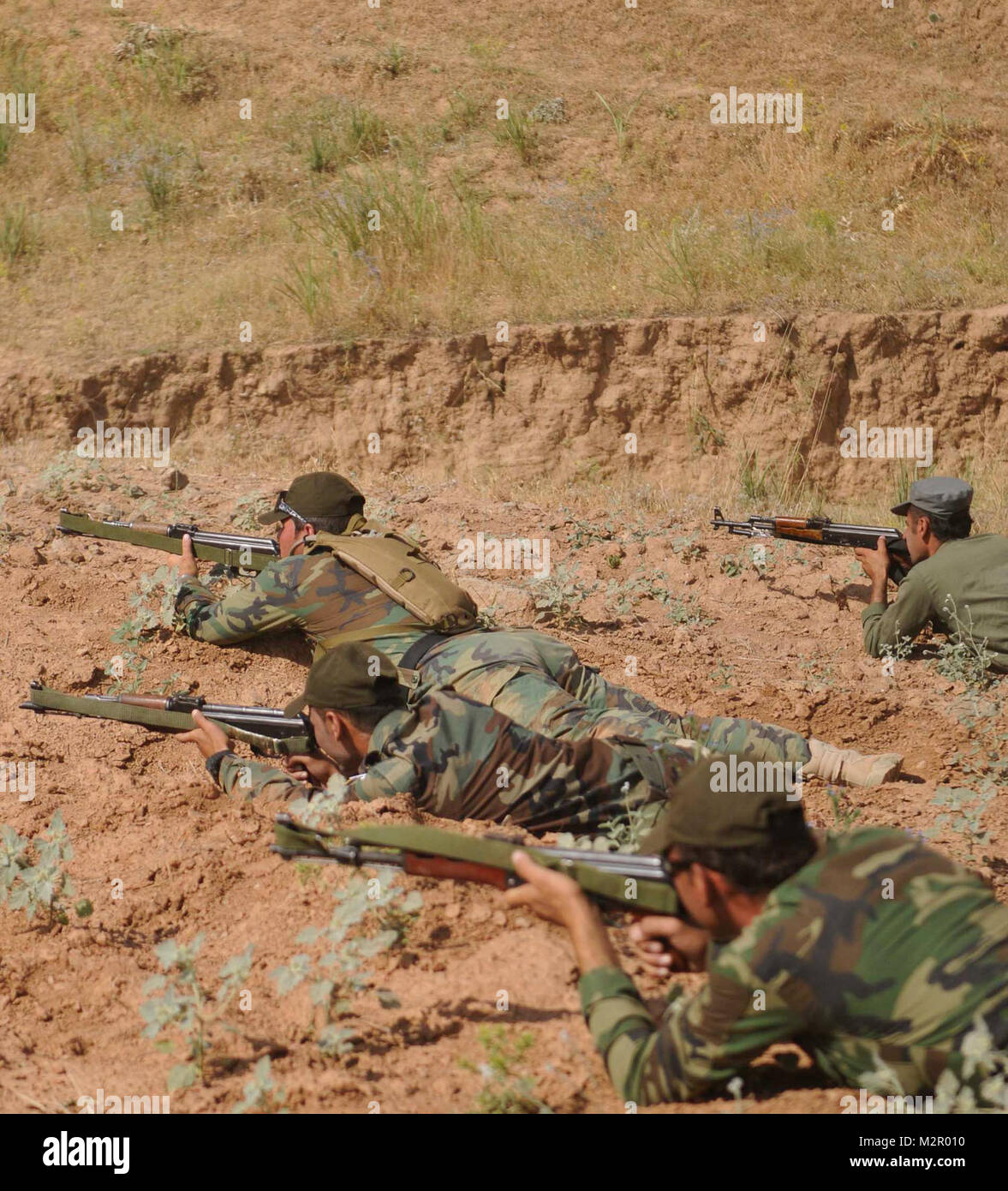 Support by fire. MANILA TRAINING CENTER, Iraq – A fire team of Kurdish ...