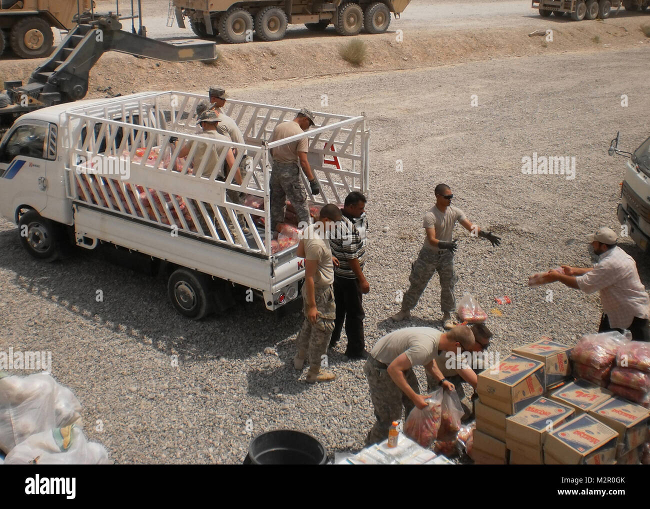 Soldiers load supplies. CONTINGENCY OPERATING BASE COBRA, Iraq ...