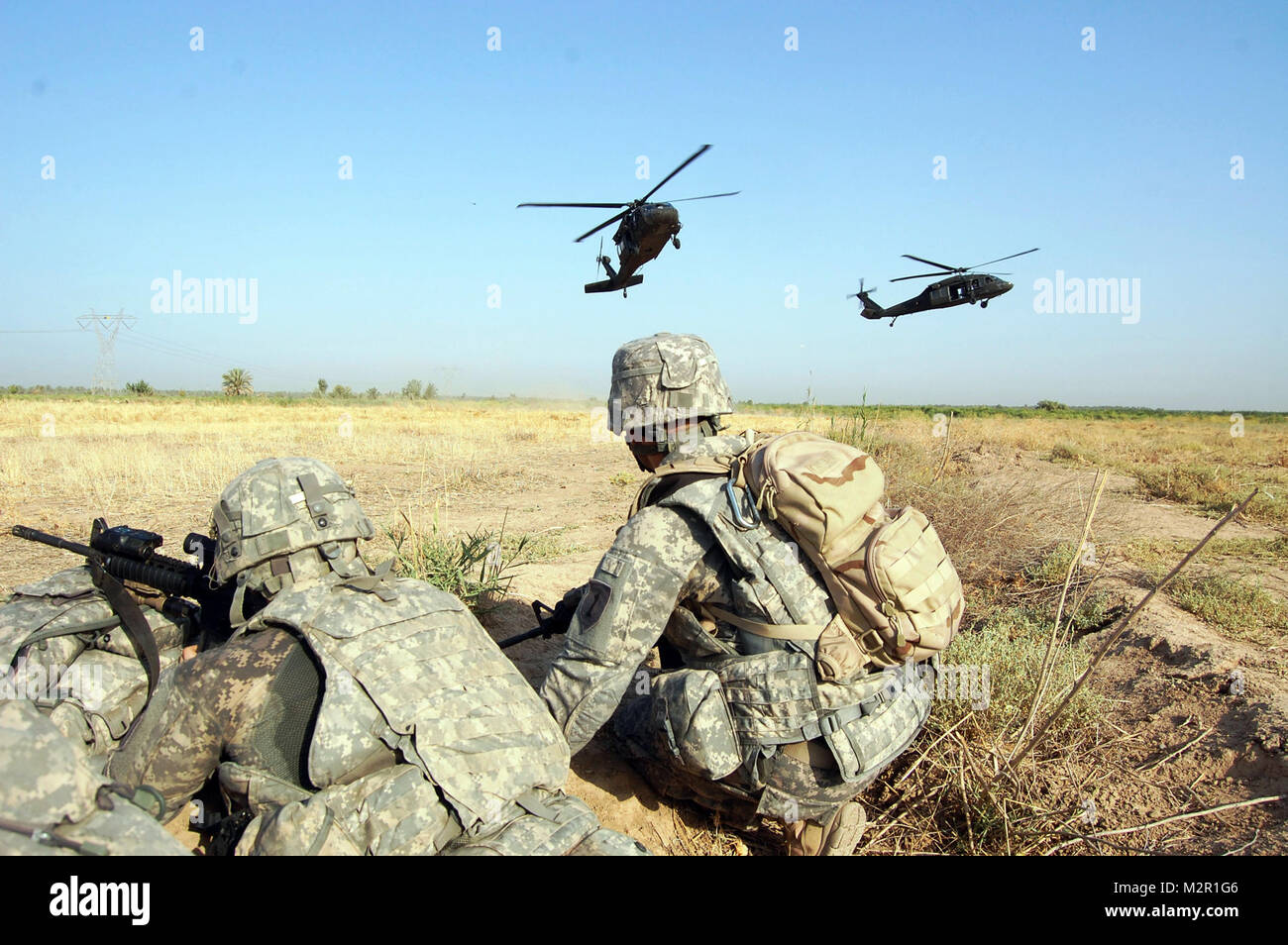 BAGHDAD—Spc. David Judkins, left, a combat medic with Ghost Platoon ...