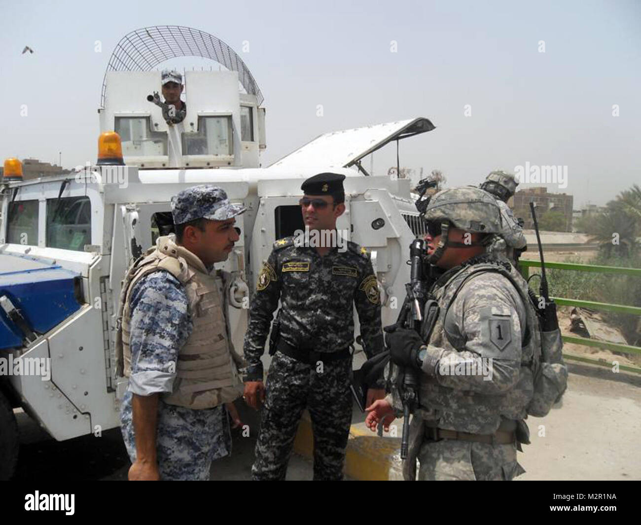 BAGHDAD—First Lt. Donald Gillilan, right, platoon leader of the ...