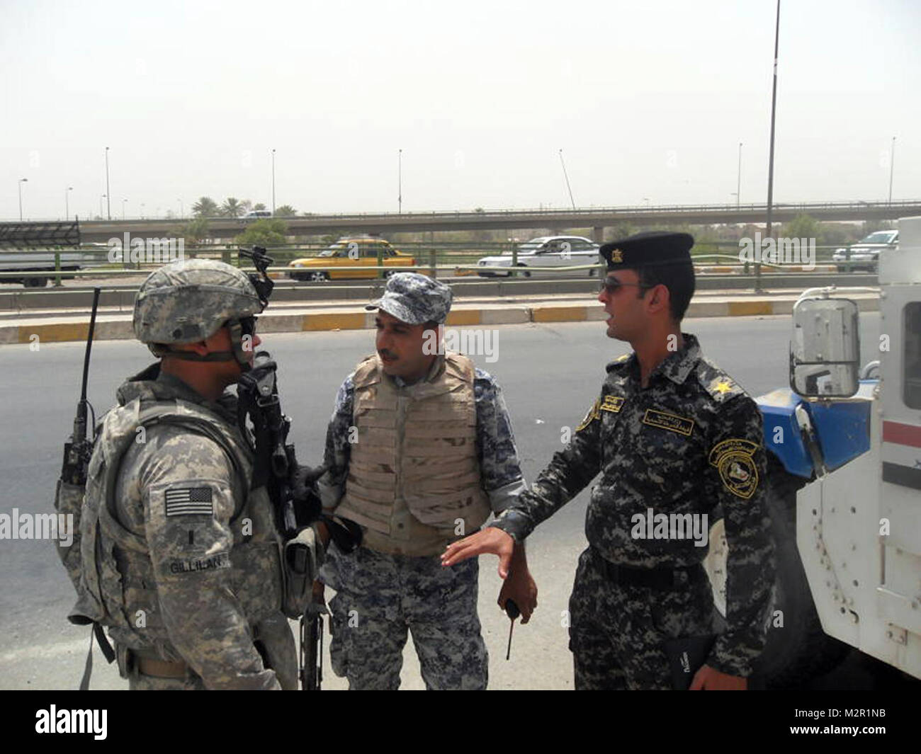 BAGHDAD—First Lt. Donald Gillilan, left, platoon leader of the personal ...