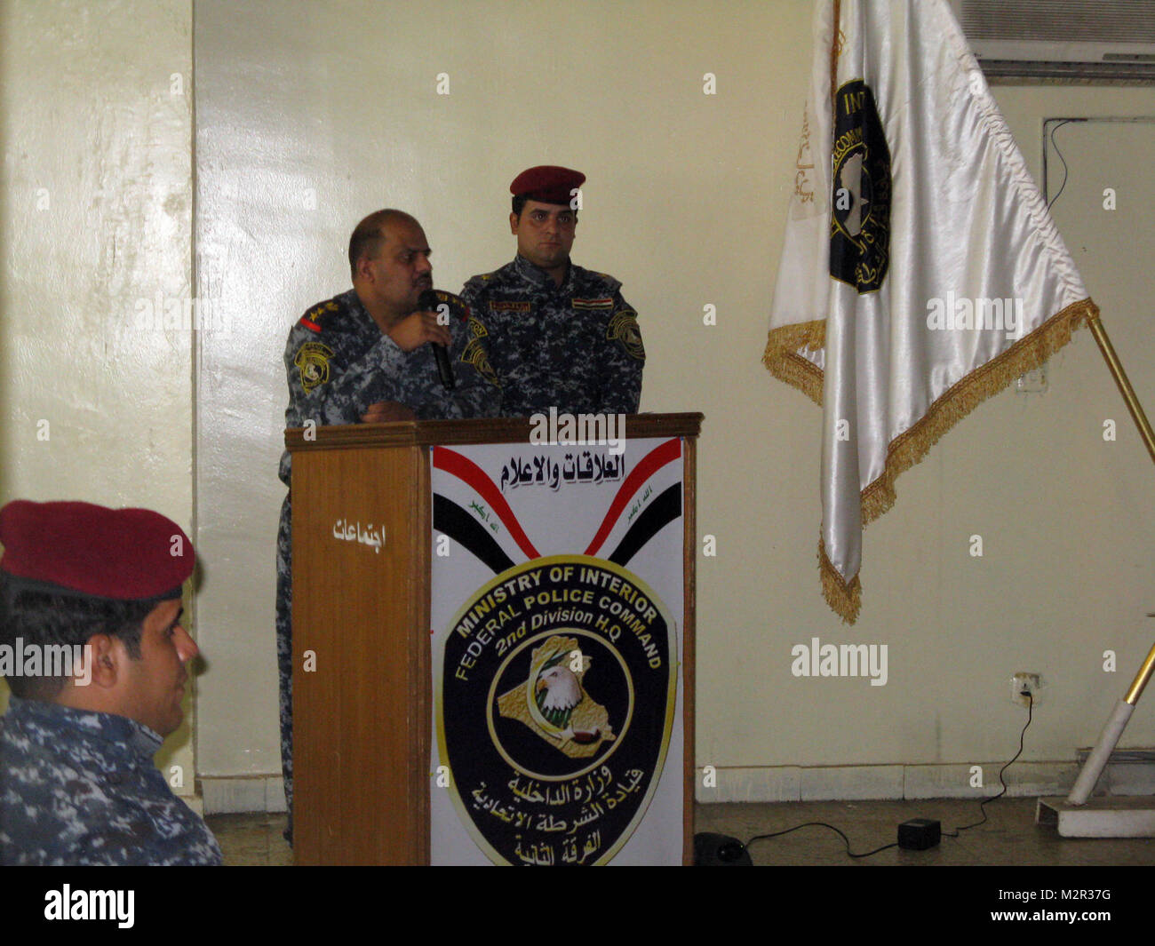 BAGHDAD—Staff Col. Salman Abdulla Waleed, at podium, training officer ...