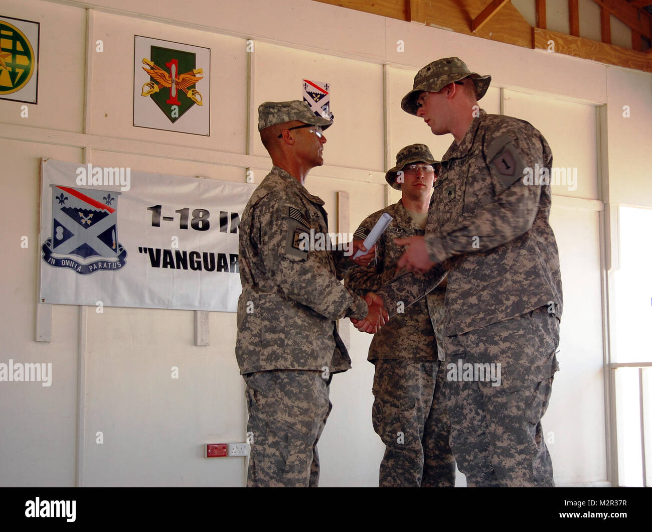 BAGHDAD—Command Sgt. Maj. Earl Rice, left, senior enlisted adviser to ...