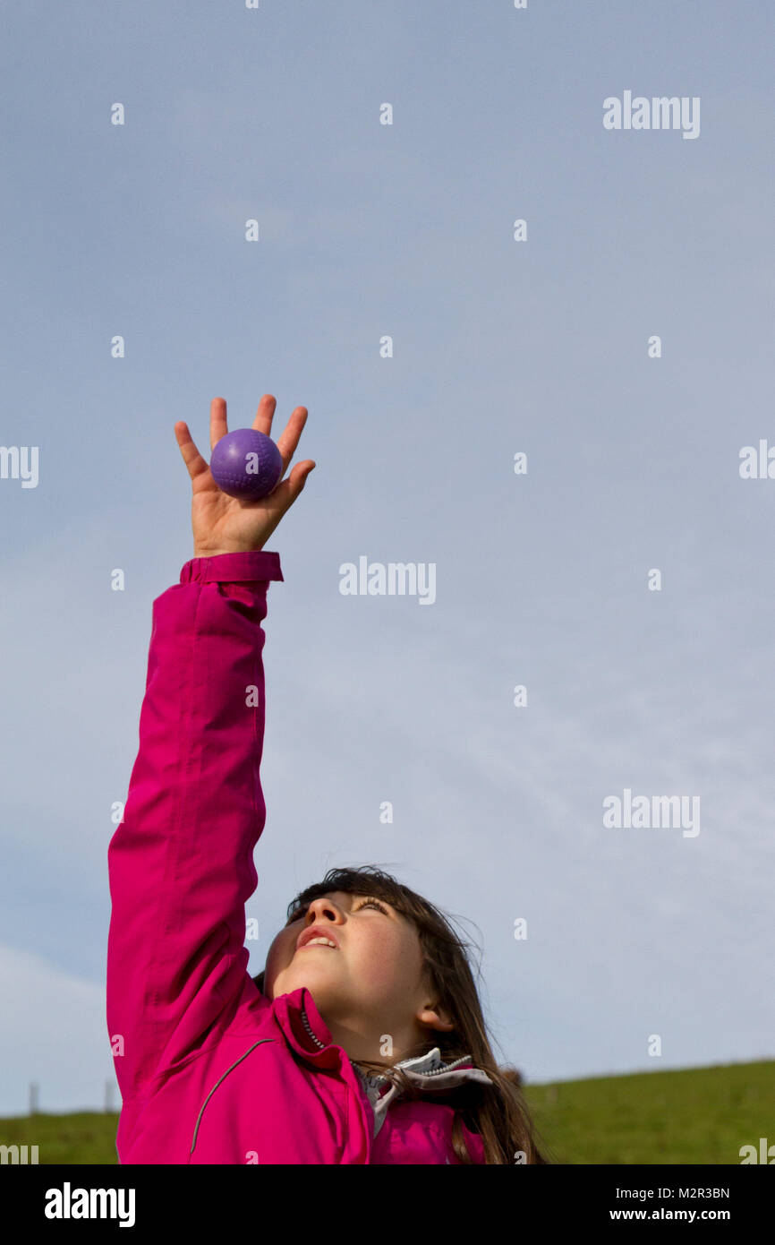 Child catching ball hi-res stock photography and images - Alamy