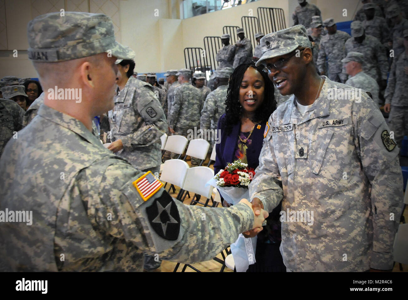 Soldiers of the 501st Sustainment Brigade gathered at the Camp Carroll ...