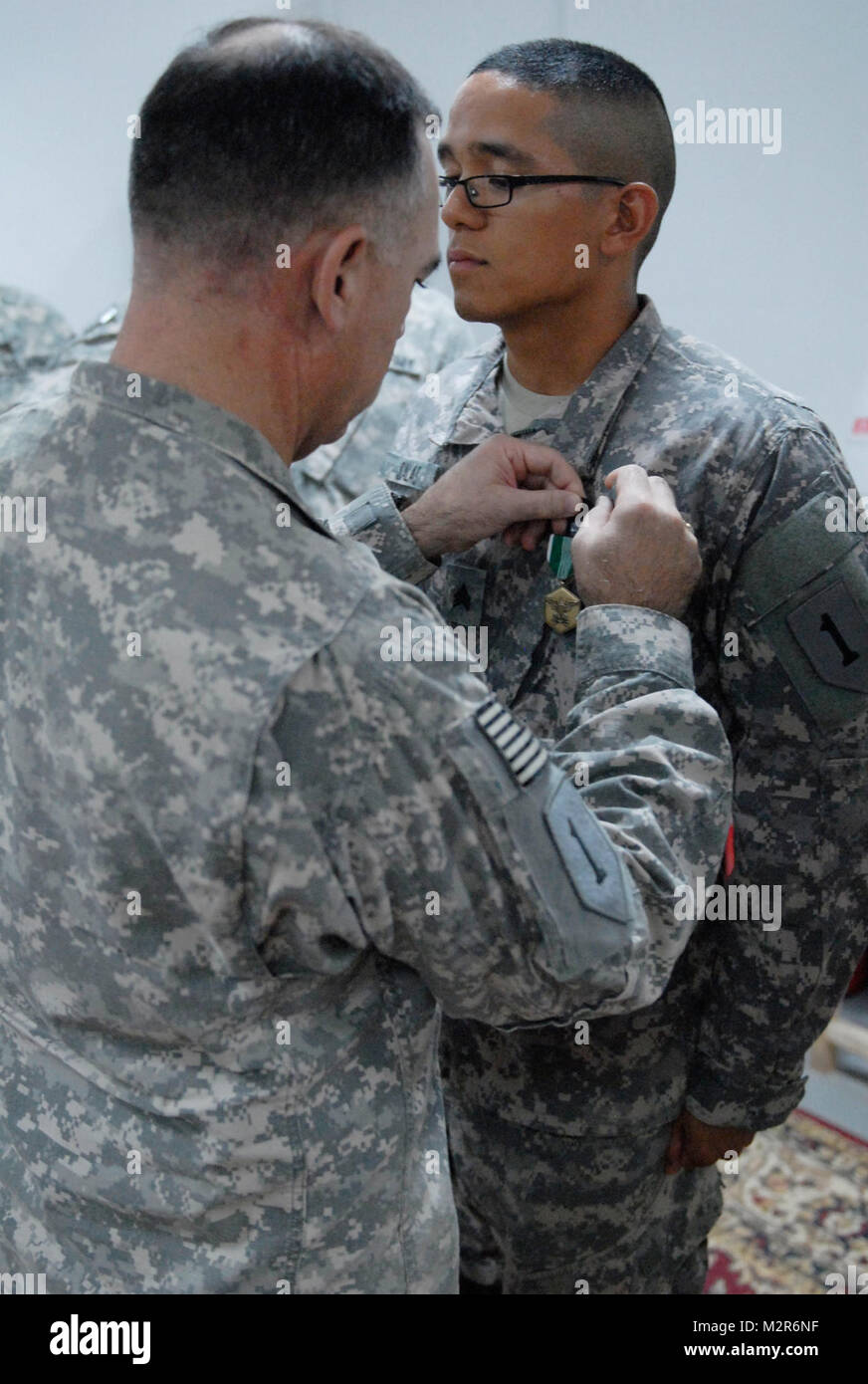 Col. Paul Calvert, left, commander of 2nd “Dagger” Advise and Assist ...