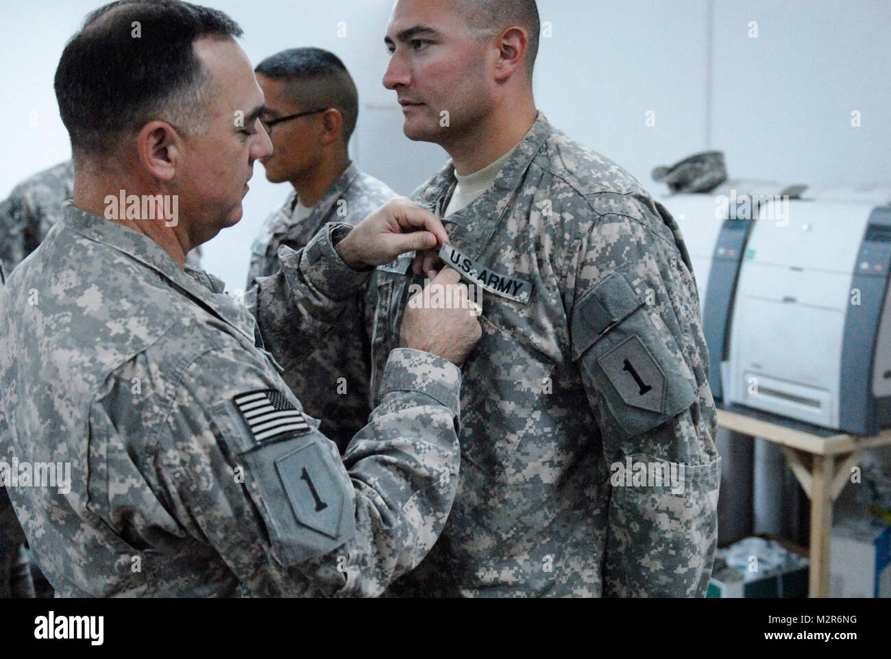 Col. Paul Calvert, left, commander of 2nd “Dagger” Advise and Assist ...