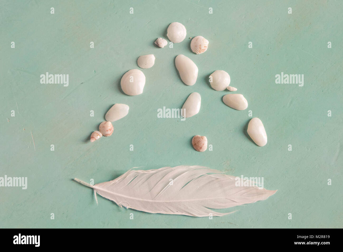 Mussels and a feather form together a sailing ship hi-res stock ...