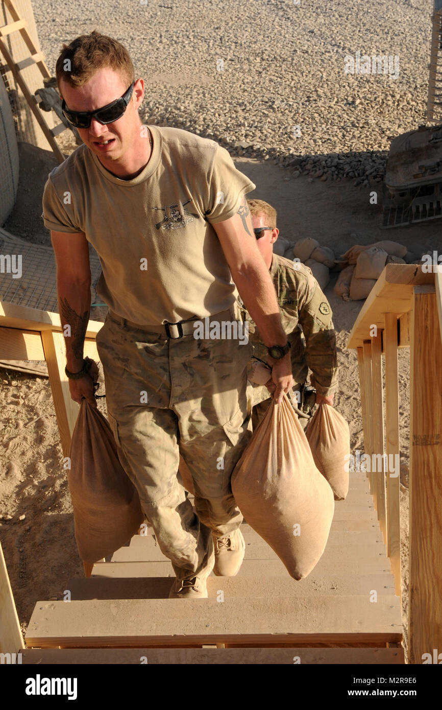 With the sun beating down, Private 1st Class Blake Parrett, Company A ...