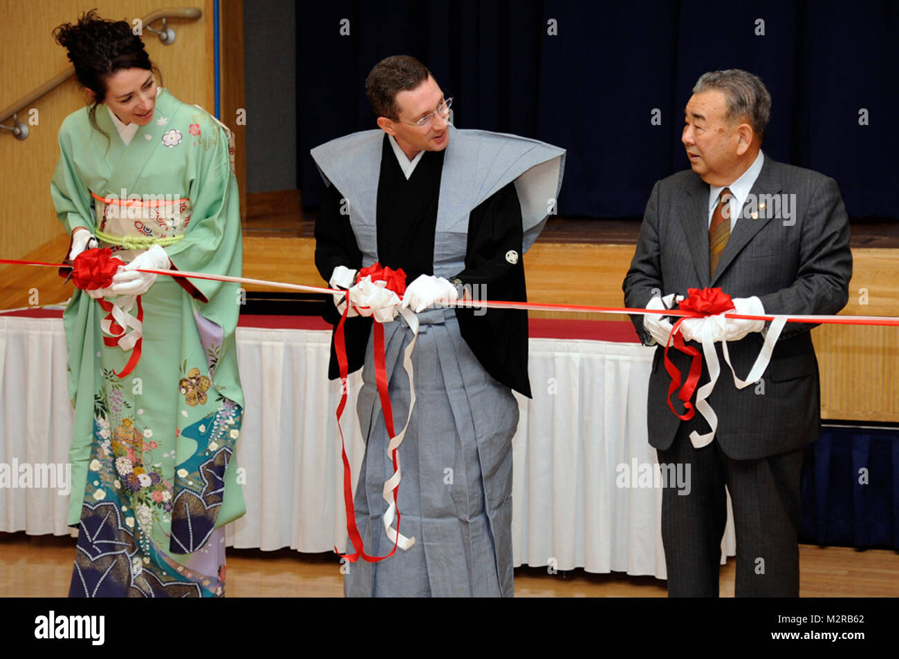 MISAWA AIR BASE, Japan - Jenn Rothstein, left, along with her husband ...
