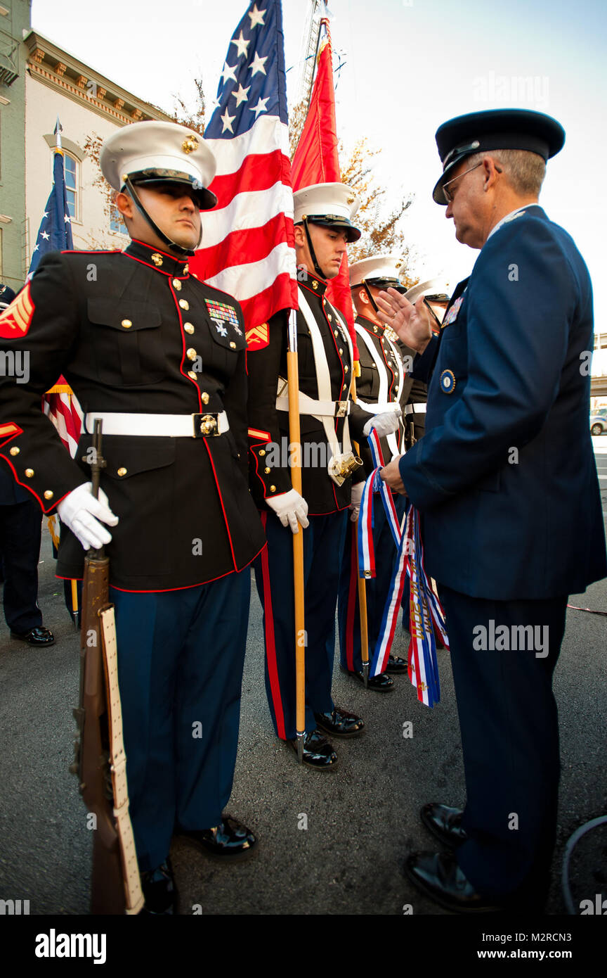 Col. Tom Curry, a former 123rd Airlift Wing chaplain, blesses a color ...