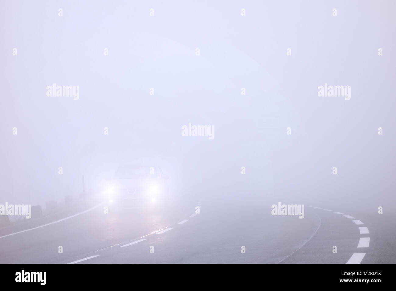 Traffic in dense fog Stock Photo - Alamy