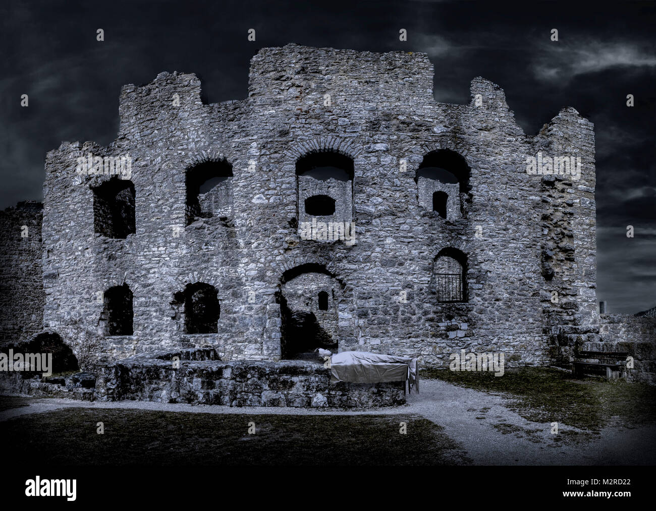 [M] CGI, 3-D, computer graphics of a dead body in front of castle ruins ...