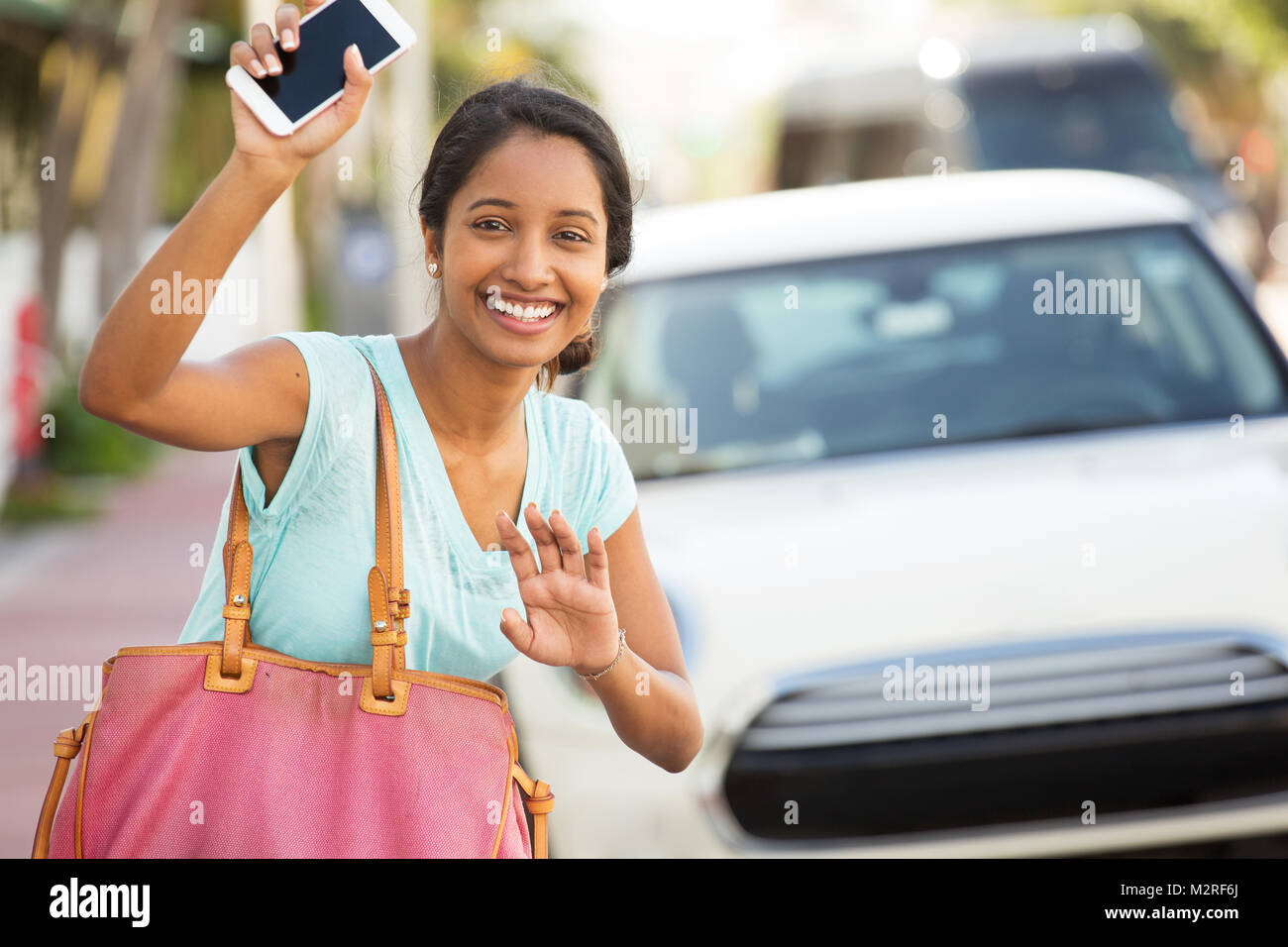 Beautiful woman smiling waving hi-res stock photography and images - Alamy