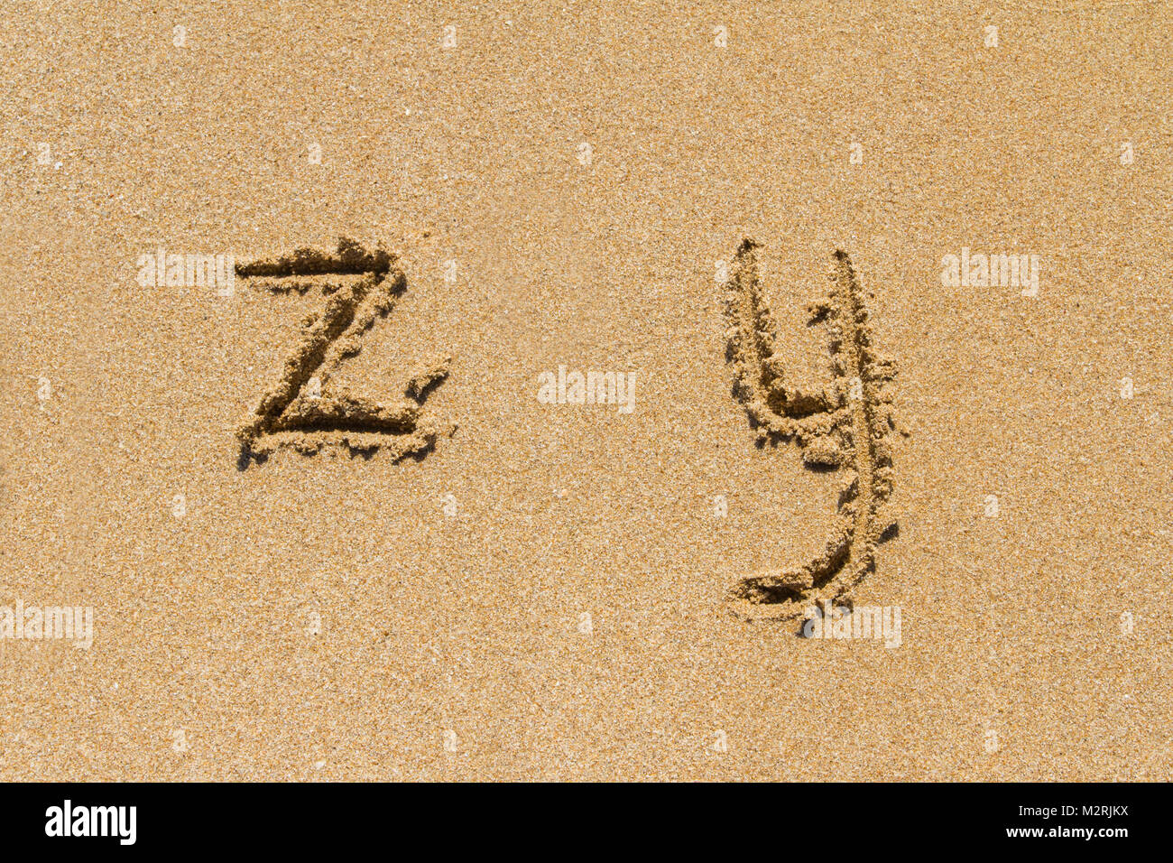 Set of zy letters of alphabet written on sand with lower case Stock ...