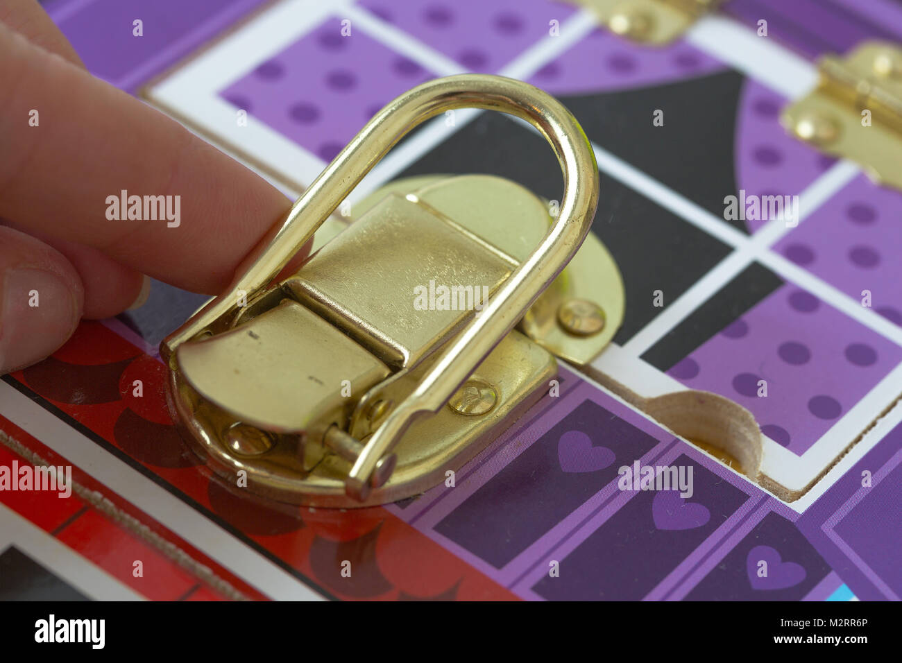 A game with locks. The child opens the locks. Busy-board for For ...