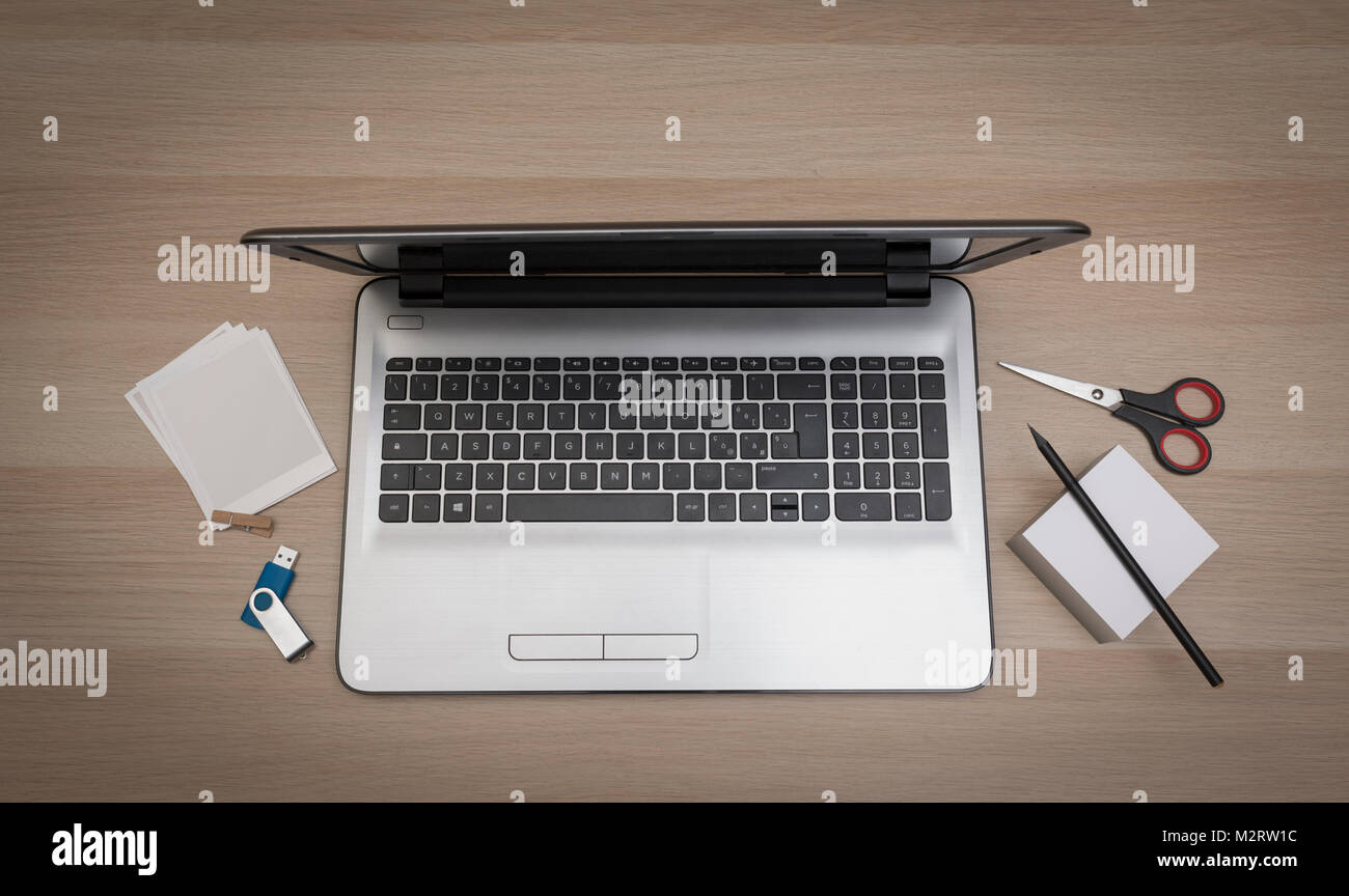 notebook on office desk with stationery items Stock Photo - Alamy