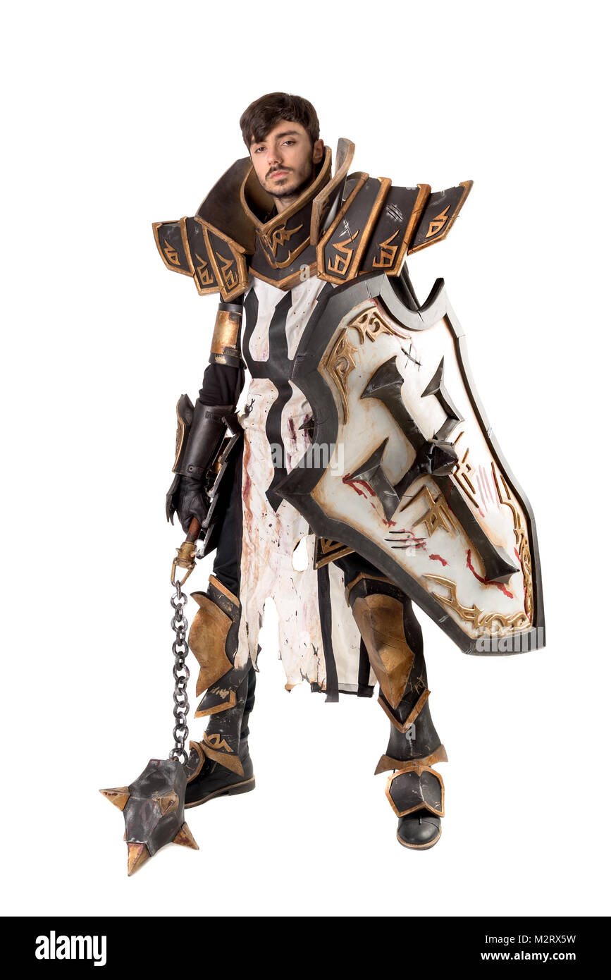 Young man cosplaying with fantasy knight costume Stock Photo - Alamy