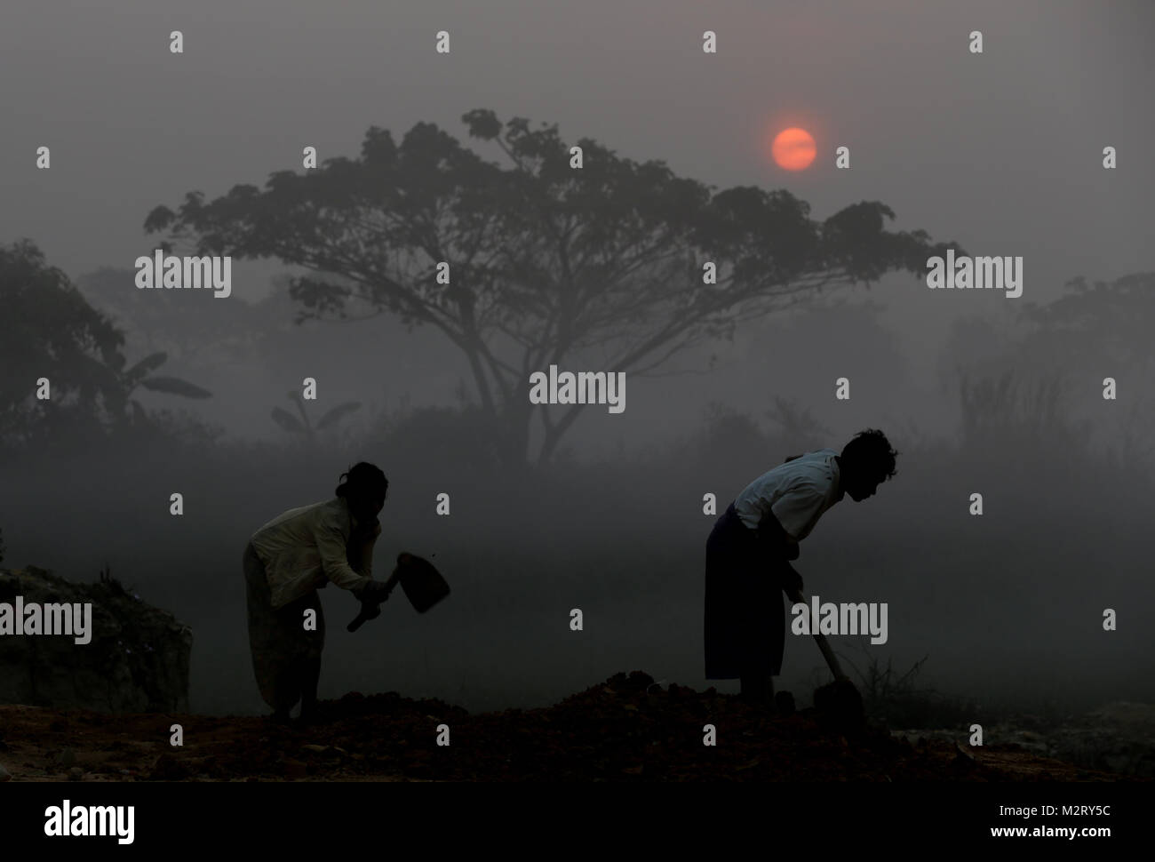 Yangon, Myanmar. 8th Feb, 2018. Laborers work at a brick factory on the ...