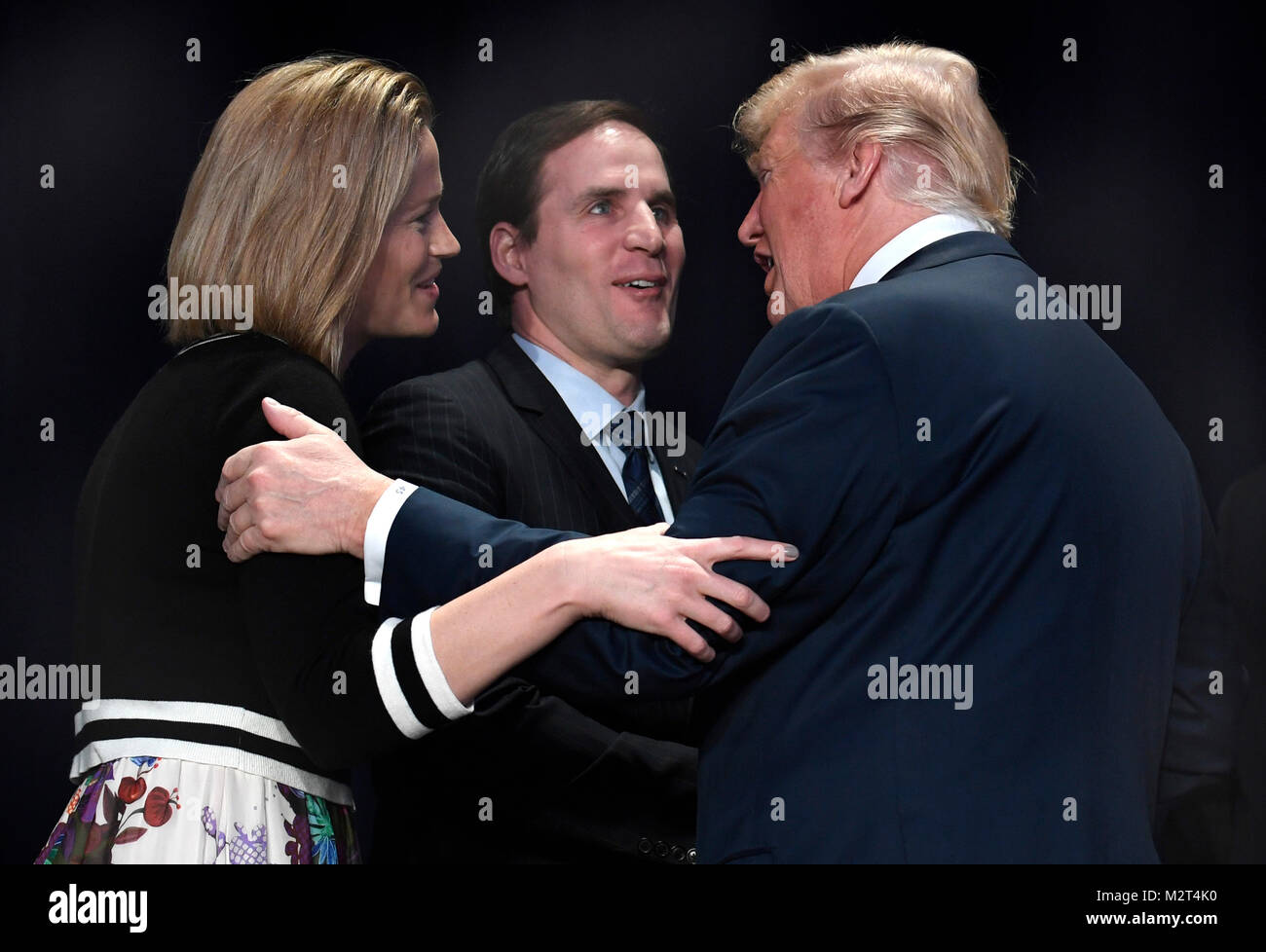 United States President Donald J. Trump, right, embraces US Army Major ...