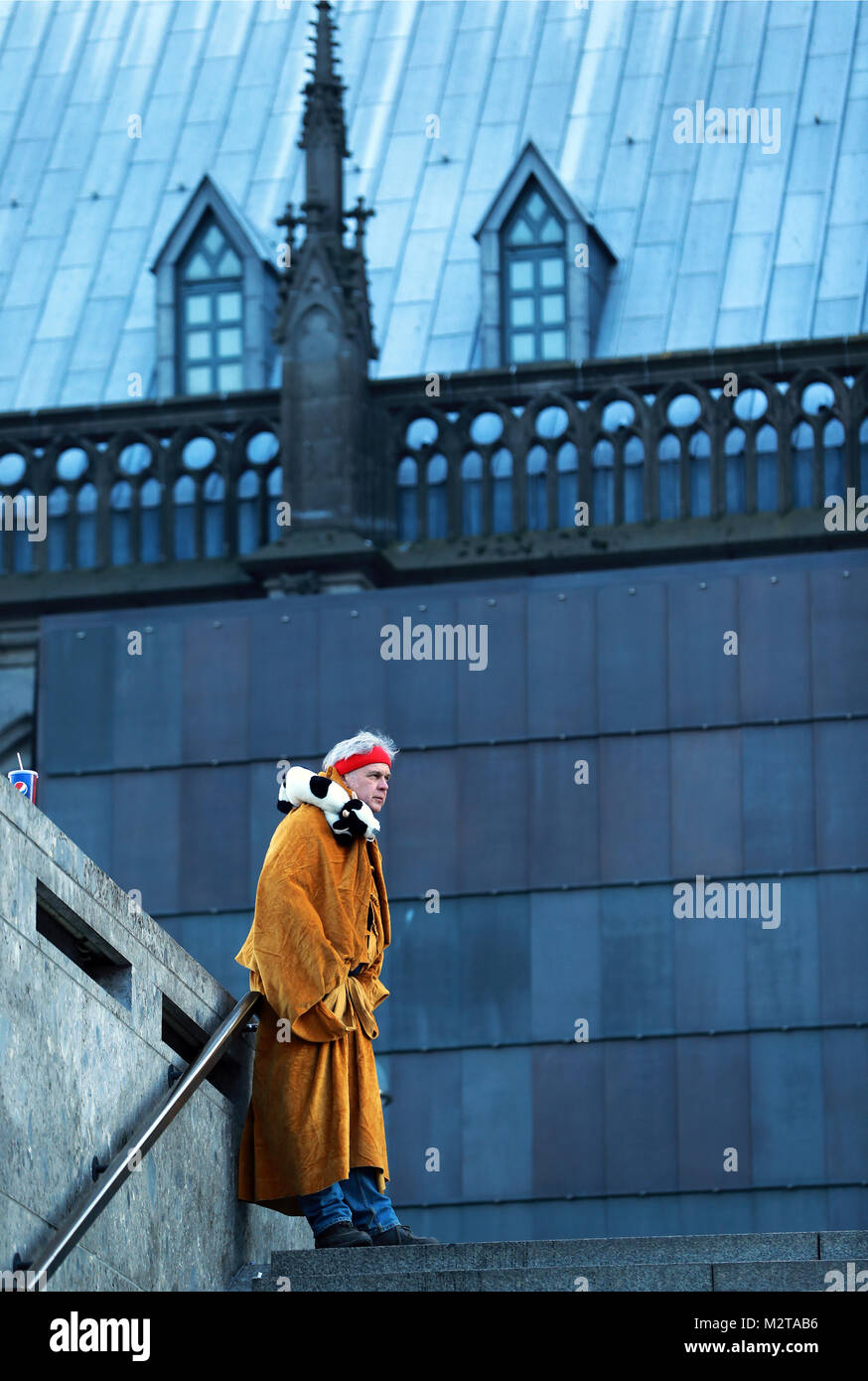 Cologne, Germany. 8th Feb, 2018. A man takes part in the street ...