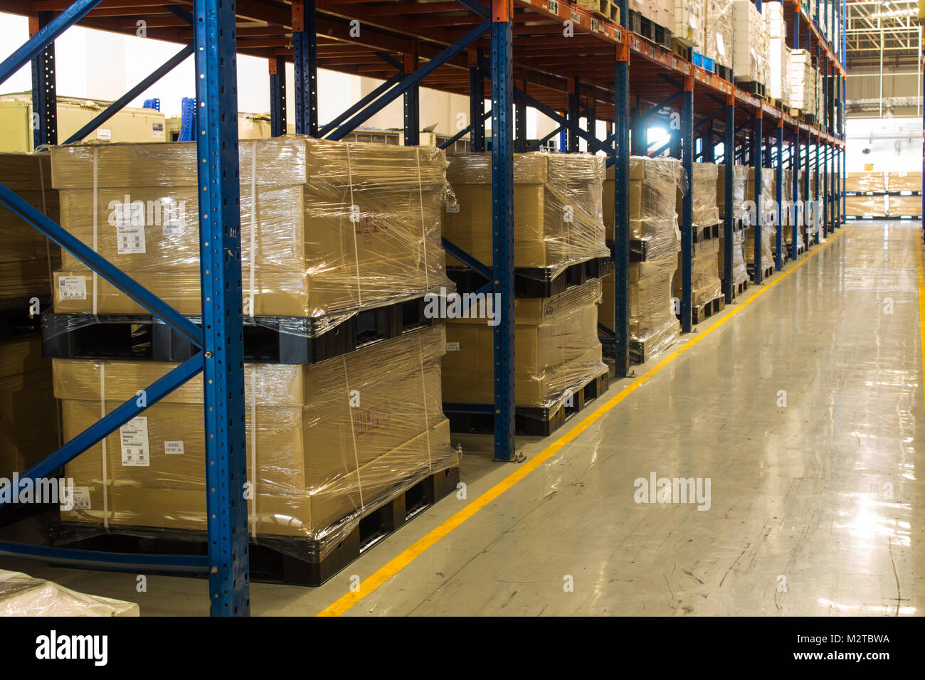 warehouse. Rows of shelves with boxes Stock Photo - Alamy