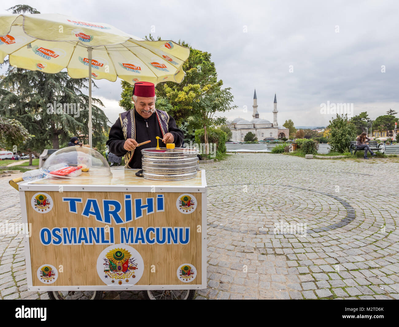 Unidentified man sells Ottoman Macun(Paste),soft, sweet and colorful ...