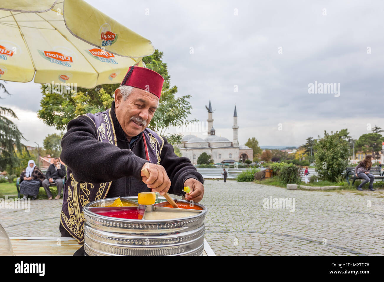 Unidentified man sells Ottoman Macun(Paste),soft, sweet and colorful ...