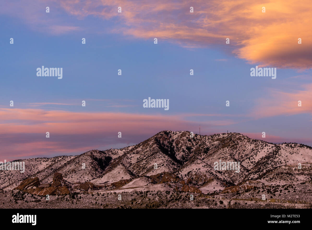 Red Rocks, with Mount Morrison behind it at sunrise. Morrison, Colorado ...