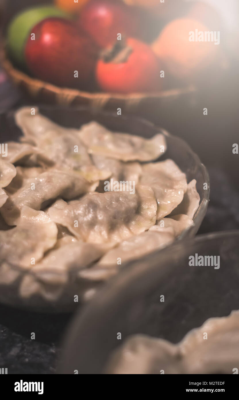 Traditonal Polish food called pierogi in a glass bowl ready to be ...