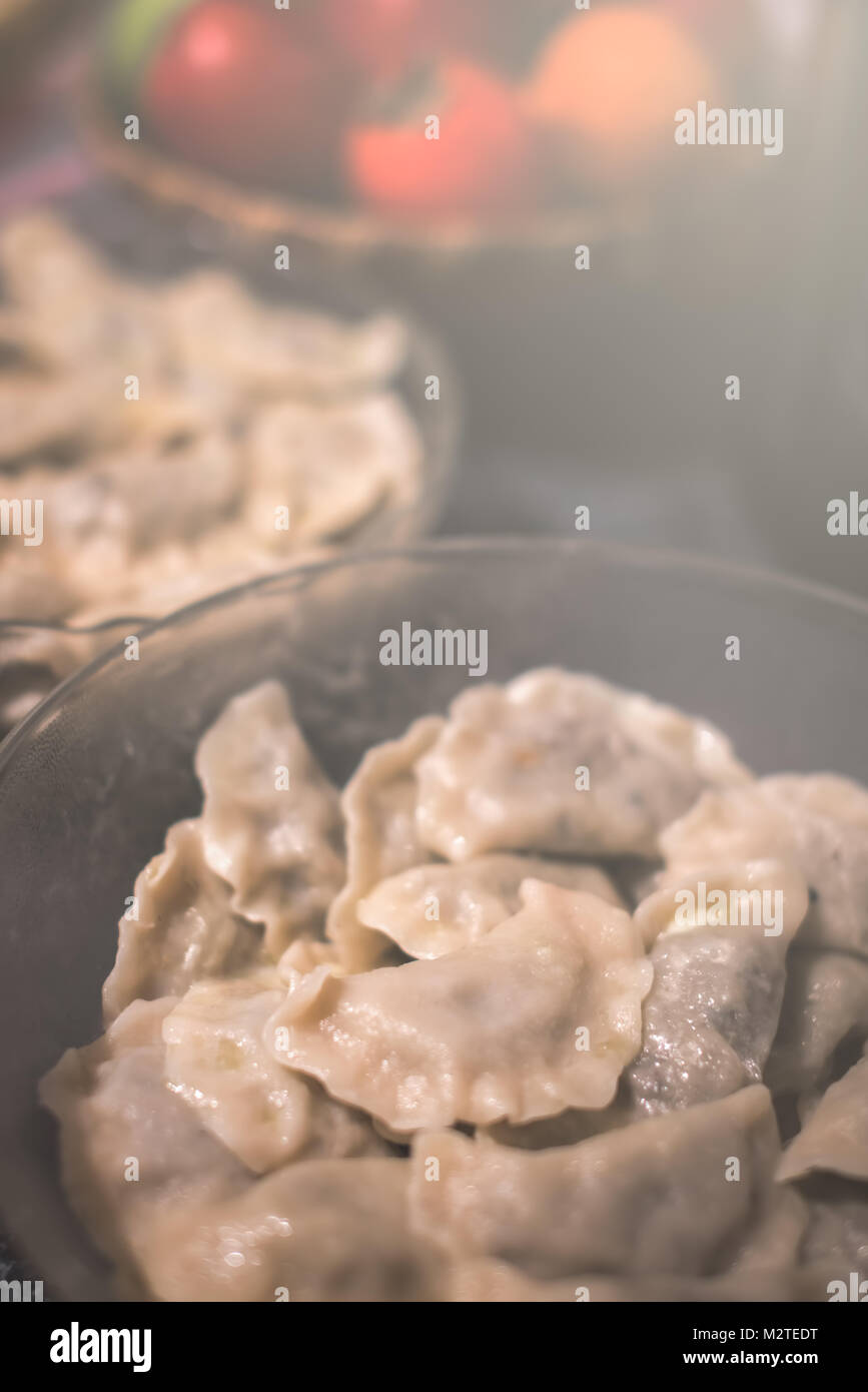 Traditonal Polish food called pierogi in a glass bowl ready to be ...